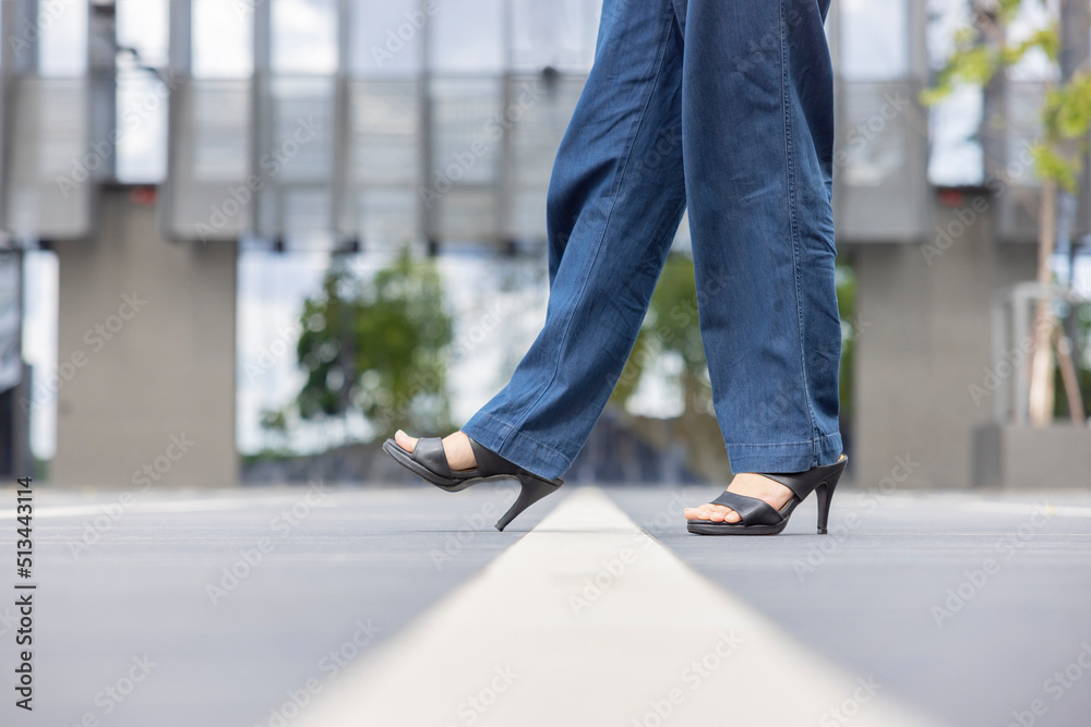 Moving forward, New start and Success Concept - Woman's feet in black ...