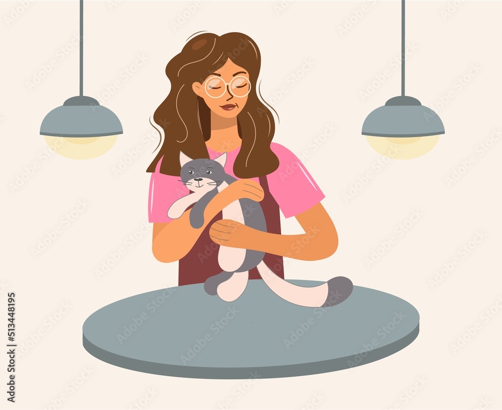 Cute young girl with a cat, a pet. Love and friendship with animals ...