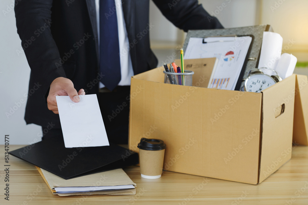 Resignation Concept . Businessman sending a resignation letter to the ...