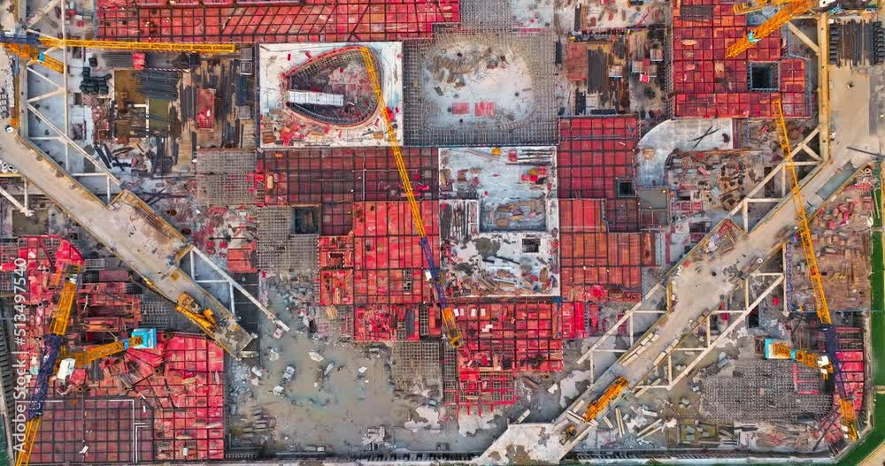 Aerial footage of city commercial building construction site. High ...