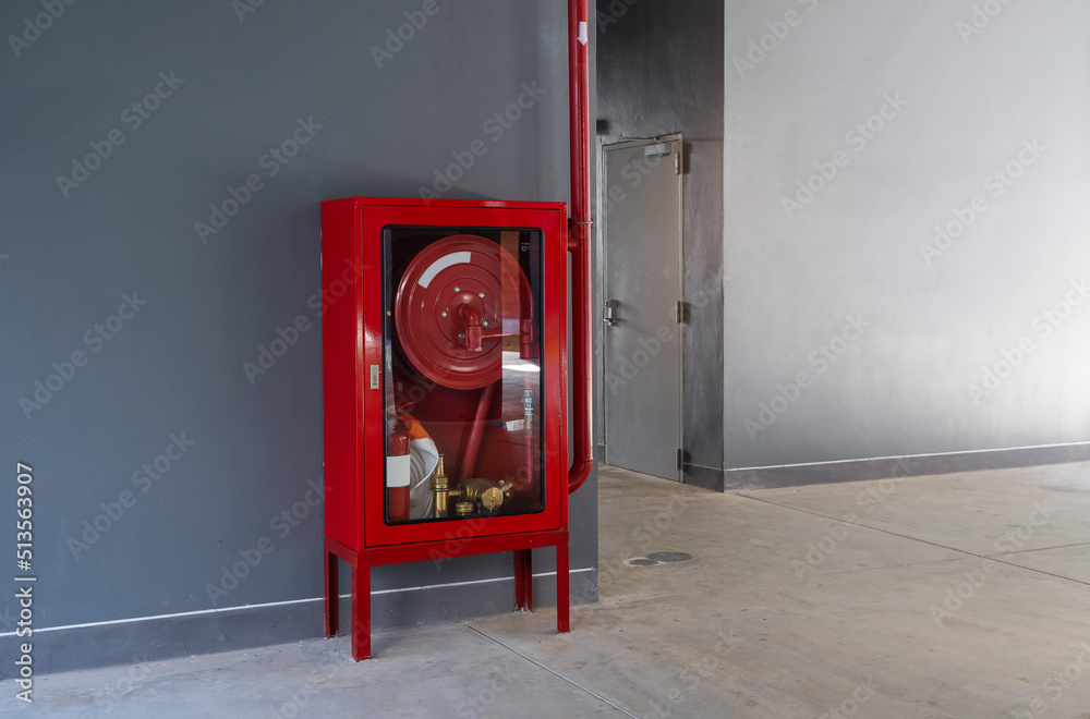 Fire extinguisher cabinet in the hall of office building for preparing ...