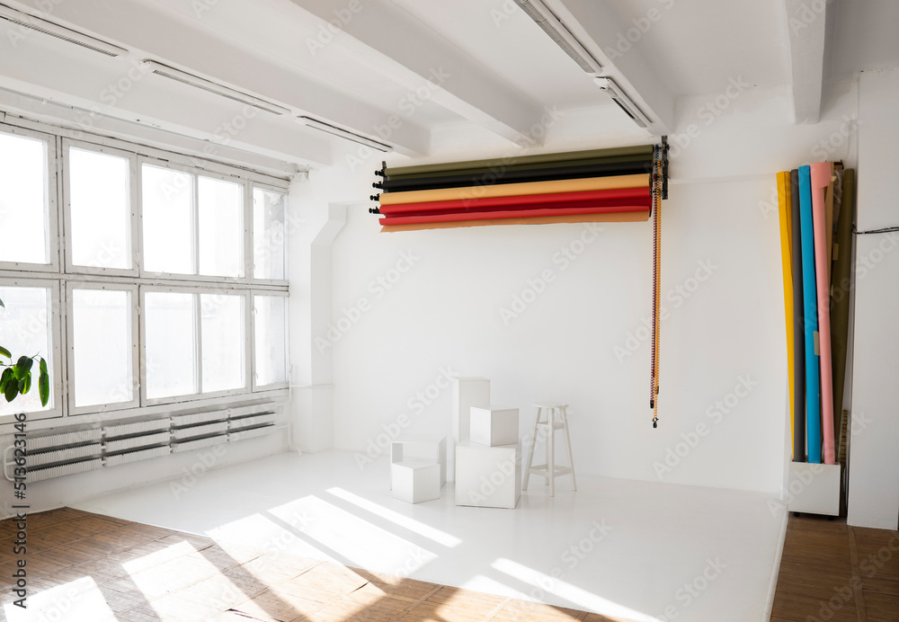 Sunny daylight photo studio interior with a huge panoramic vintage ...