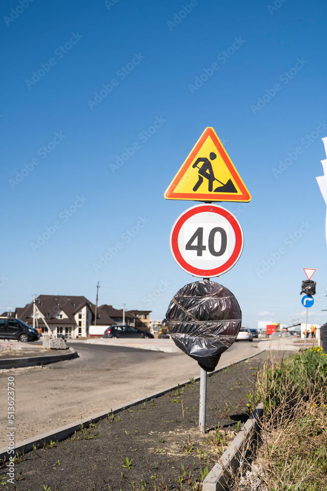 Road marking on the road, warning signs. International traffic signs ...