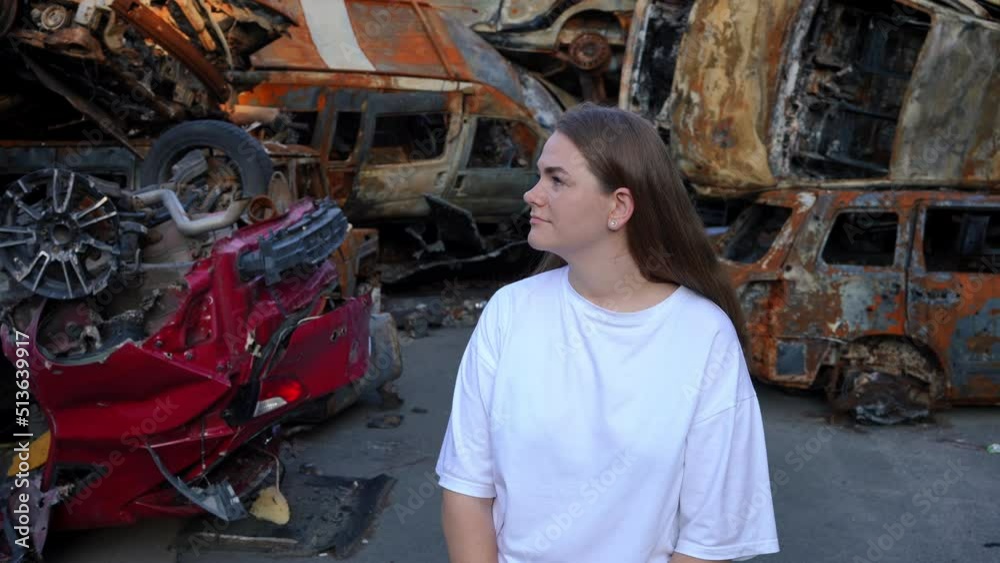 Zoom in to young thoughtful woman with sad facial expression looking ...