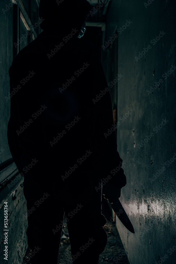 Poster Behind the murderer, he held a blood-stained knife that killed ...