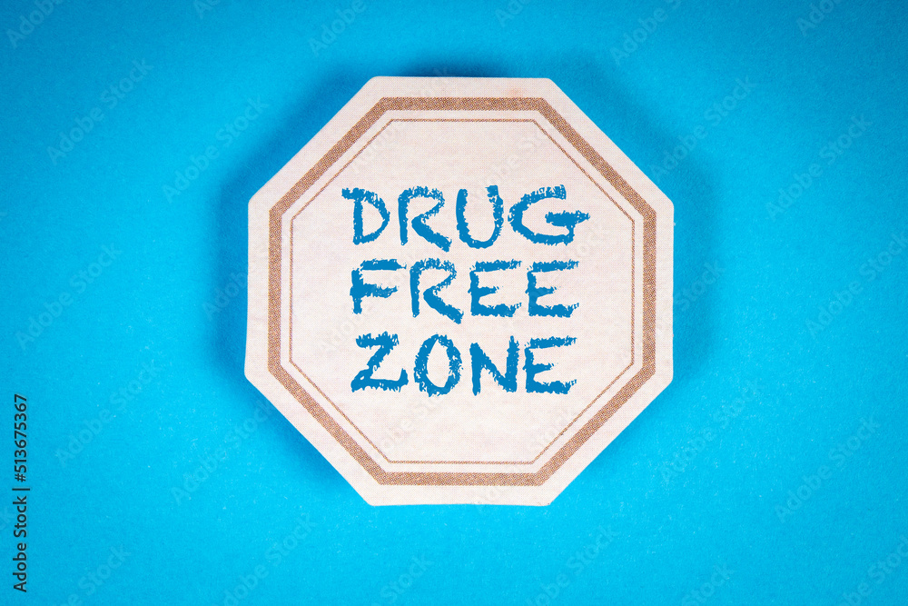 Drug Free Zone. Text on a decorative label sheet.Blue background Stock ...