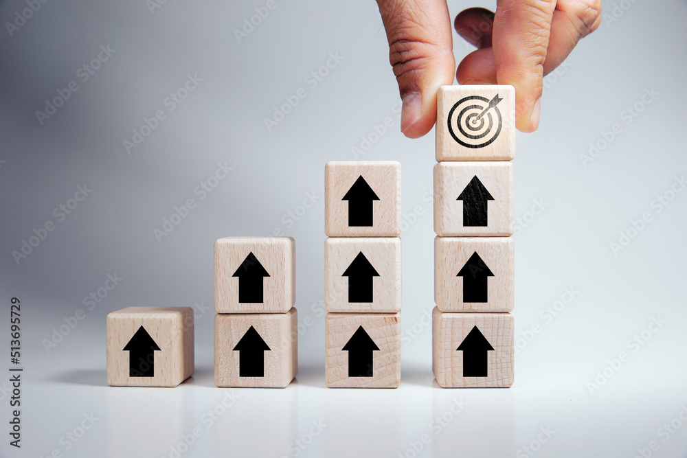 business growth concept of success of business goals Wooden cube with ...