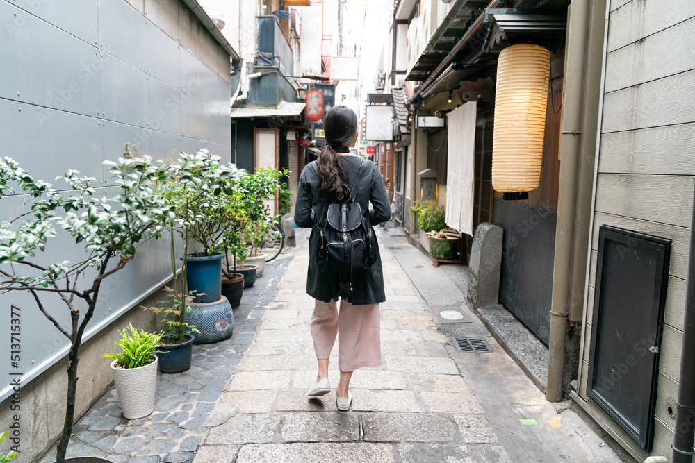 rare view with full length asian female tourist taking leisure walk in ...