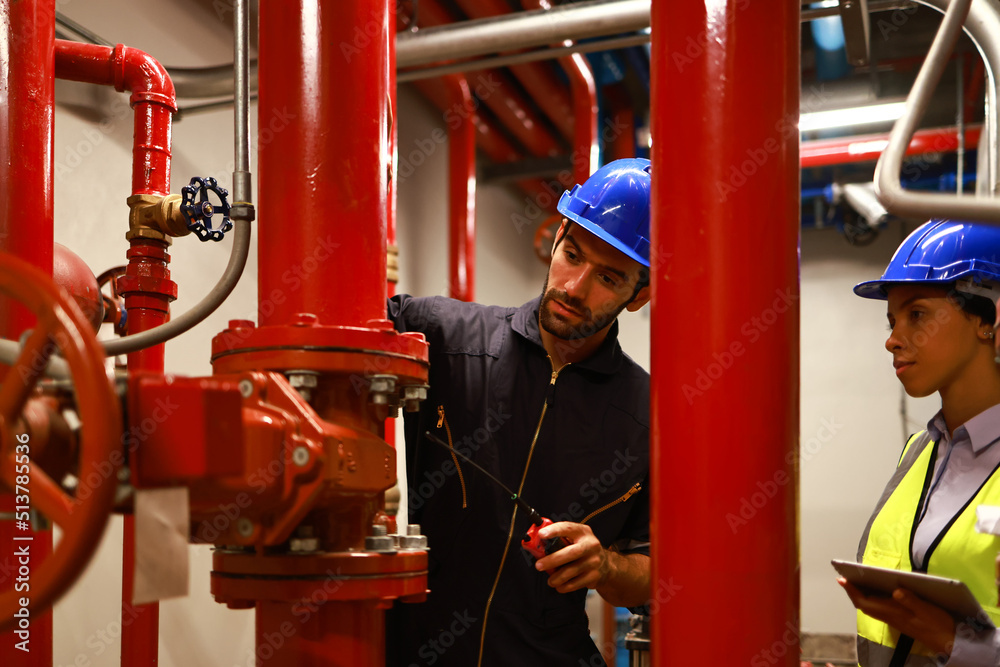 System engineer and technician work checking Fire suppression system ...