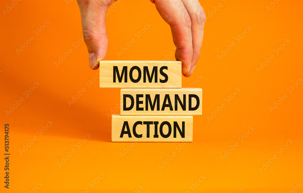 Moms demand action symbol. Concept words Moms demand action on wooden ...