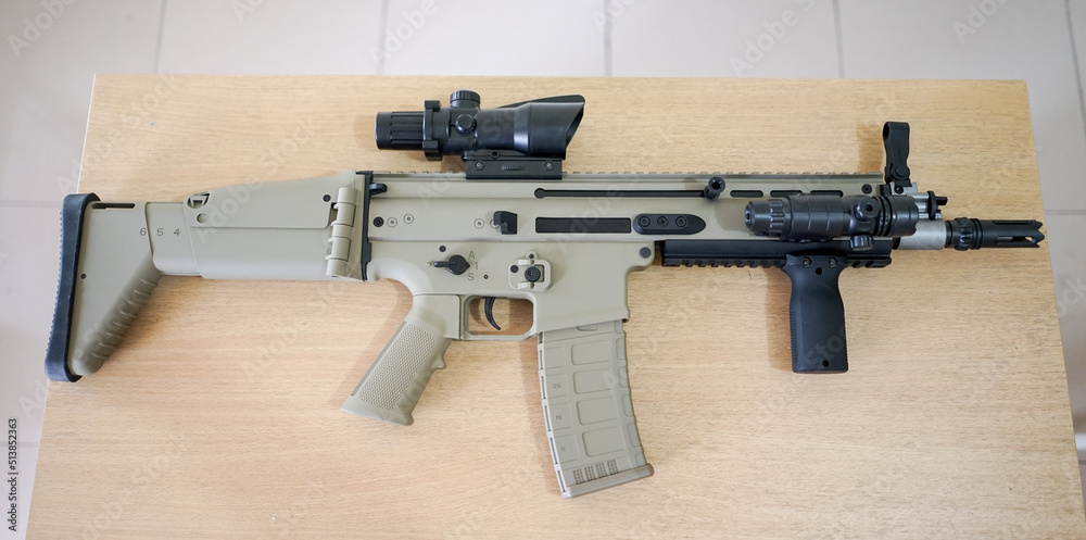 Scar-L automatic rifle at table. Weapons for police, special forces and ...