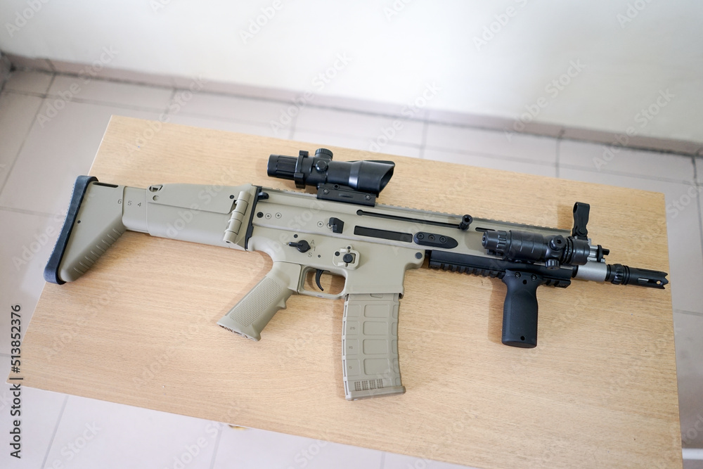 Scar-L automatic rifle at table. Weapons for police, special forces and ...