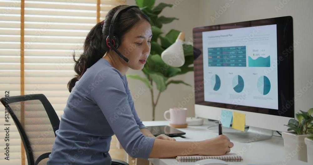 Asia people young casual woman remote work at desk home phone call talk ...