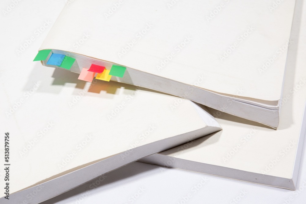 book folder with white cover and empty with bookmarks book marked with ...