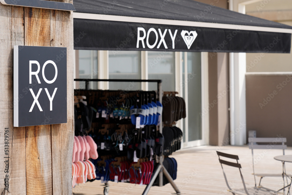 roxy logo text and sign of surf brand exterior facade shop entrance ...