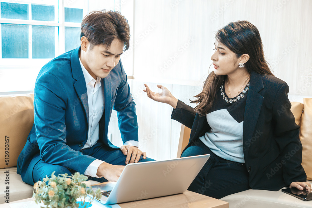 Angry asian businesswoman arguing with businessman about work failure ...