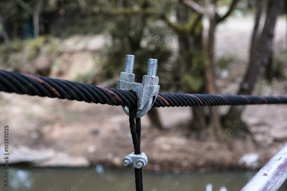 The fastening of ropes with safety locking U-Bolts made for a bridge ...