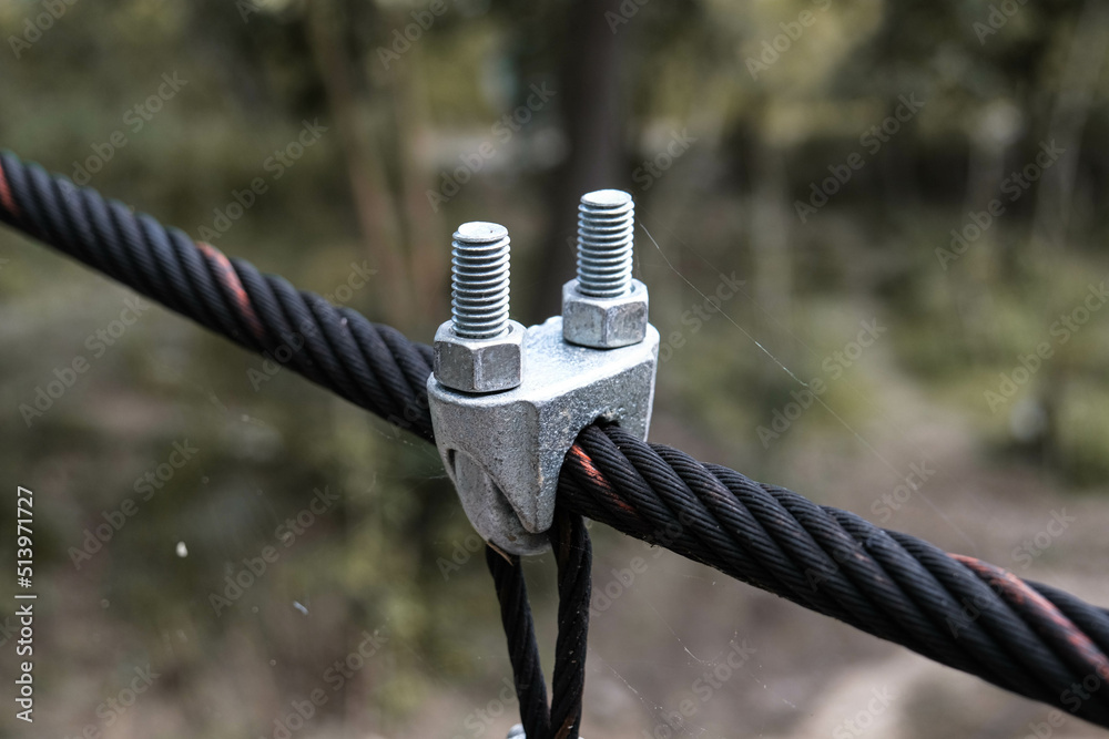 The fastening of ropes with safety locking U-Bolts made for a bridge ...