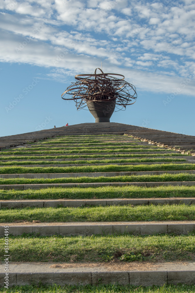 stepped mound and on top the sculpture of the lady of Manzanares in the ...