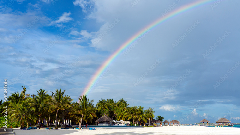 Rainbow on a tropical island. Travel in the Maldives. Outdoor ...