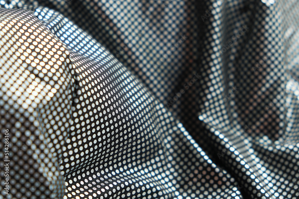 wrinkled fabric of a modern down jacket. gray warm down jacket texture ...