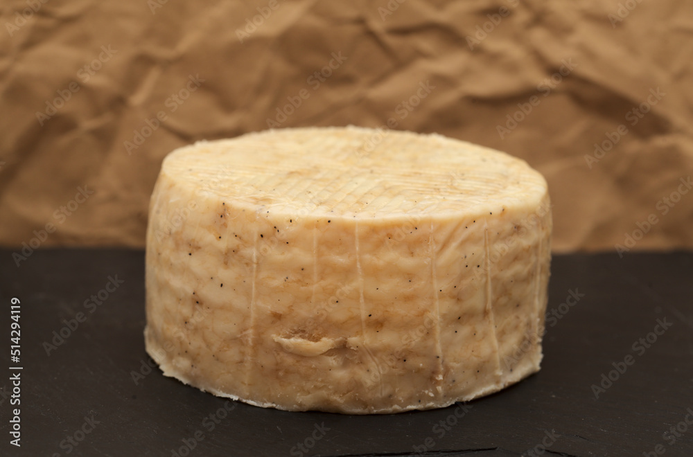 Produce of Spain - mixed milk specialty cheese with black garlic Stock ...