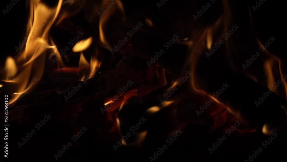 Glowing embers of bright red color, abstract background. Hot coals of a ...