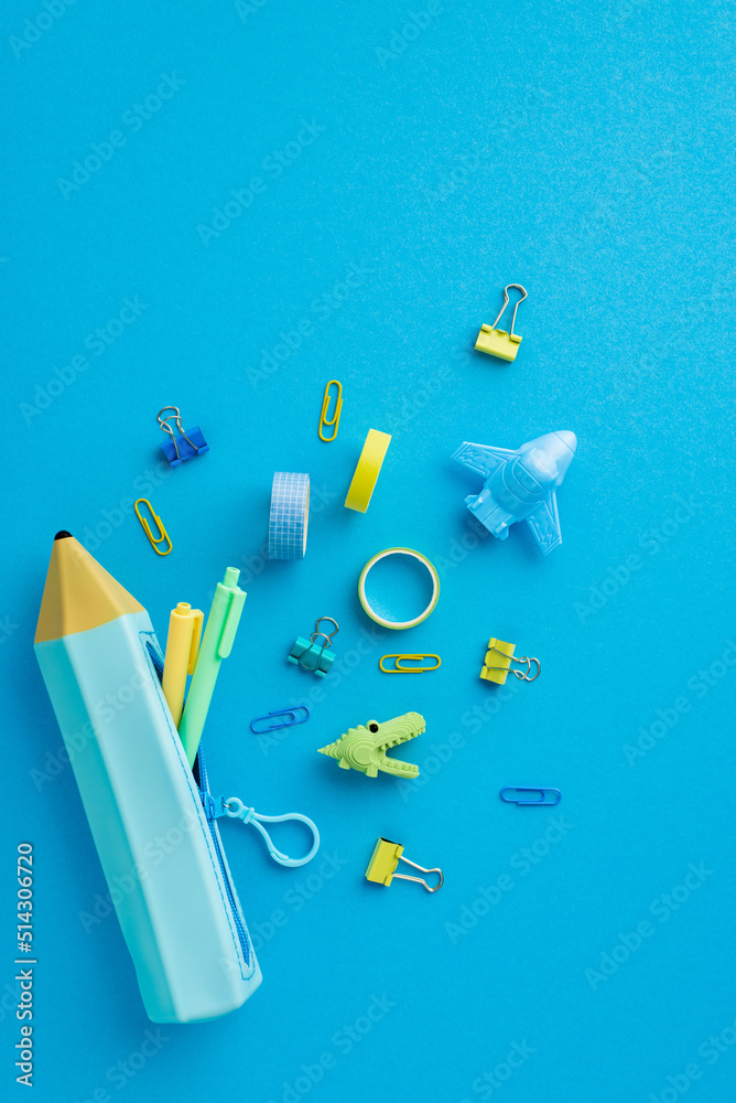 Back to school concept. Top view vertical photo of explosion of ...