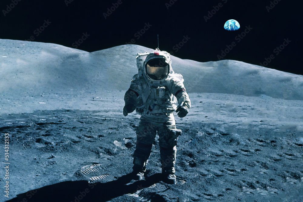 Astronaut on the moon, with the Earth in the background. Elements of ...
