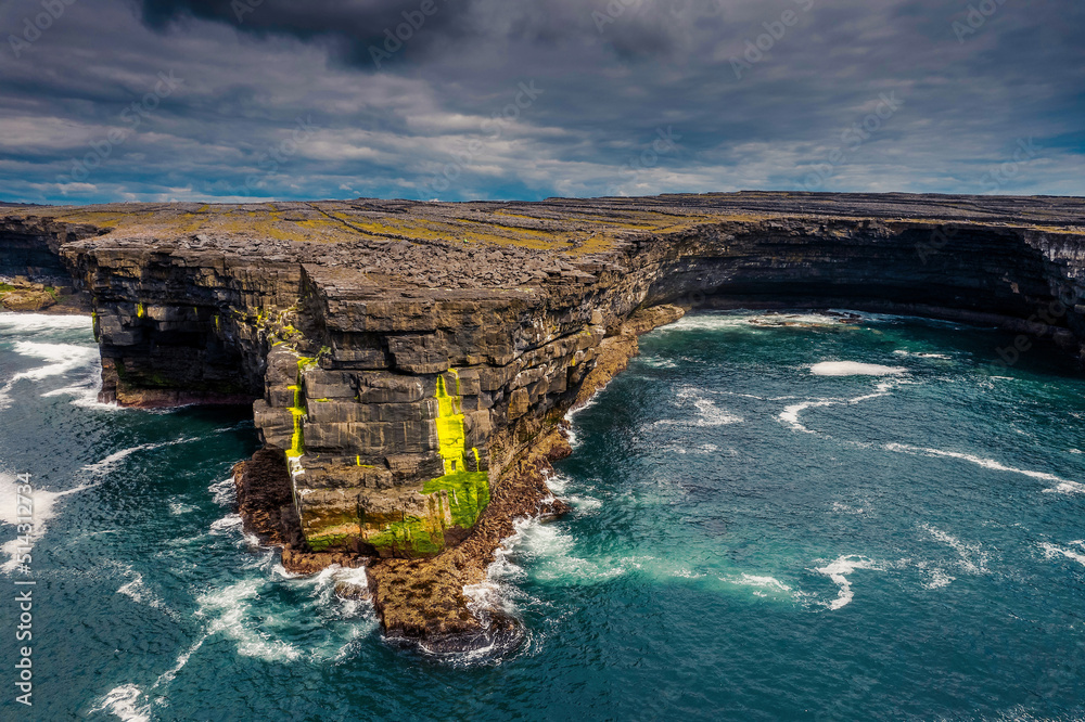 View on rough stone coast line of Aran island, county Galway, Ireland ...