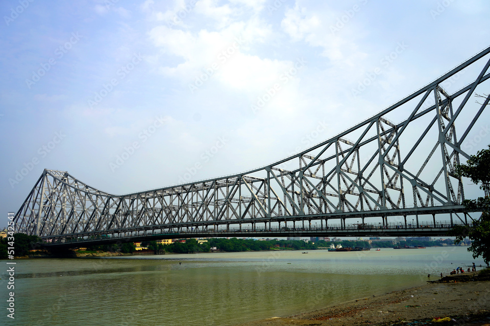 The Howrah Bridge is a balanced cantilever bridge over the Hooghly ...