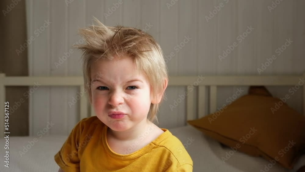 Boy joking, sticking tongue out with silly expression. Child making ...