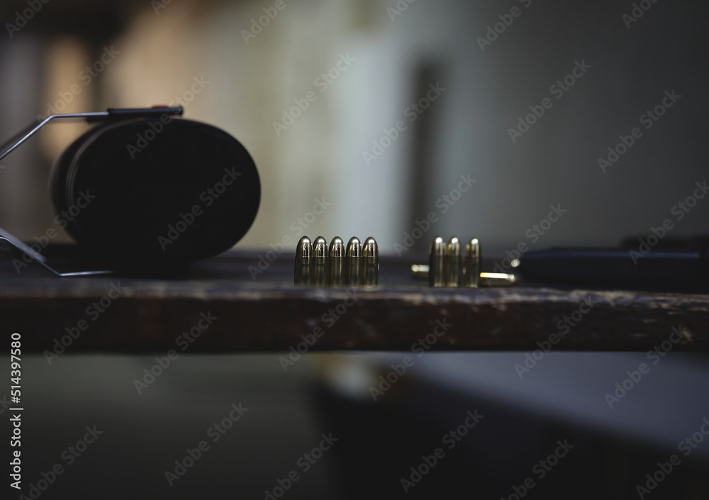 Pistol bullets and weapon magazine in a shooting club Stock Photo ...