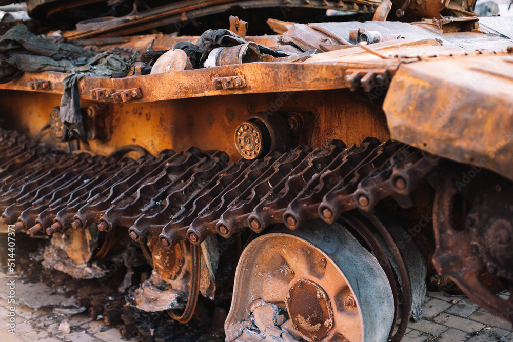 Destroyed and burned russian tank with remains of russian soldiers on ...
