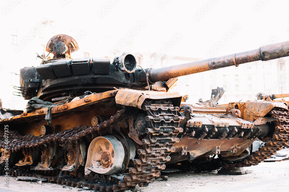 Destroyed and burned russian tank with remains of russian soldiers on ...