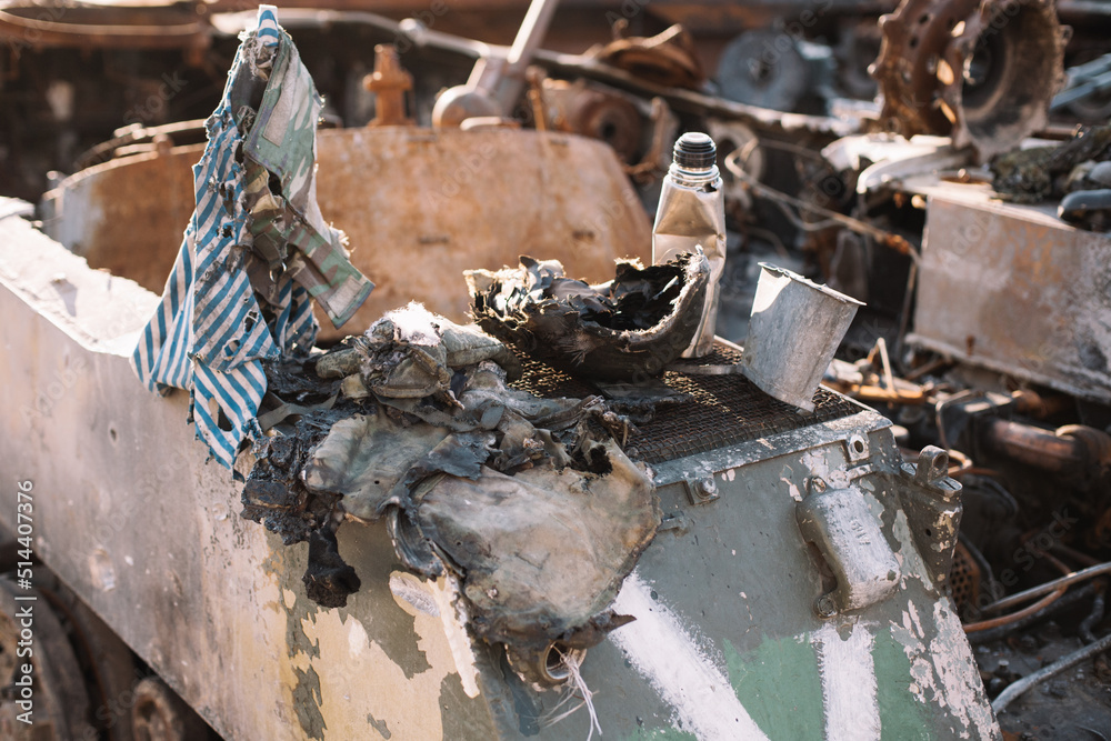 Remains of russian soldiers. Burned russian military uniform lying on ...