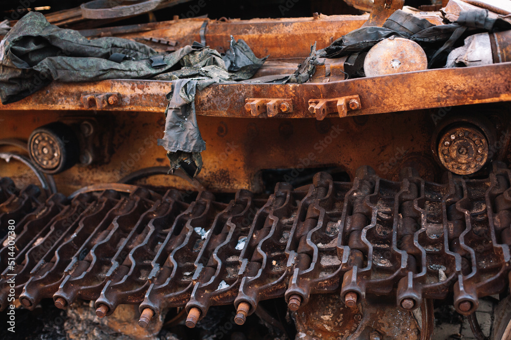Destroyed and burned russian armored military vehicle with remains of ...