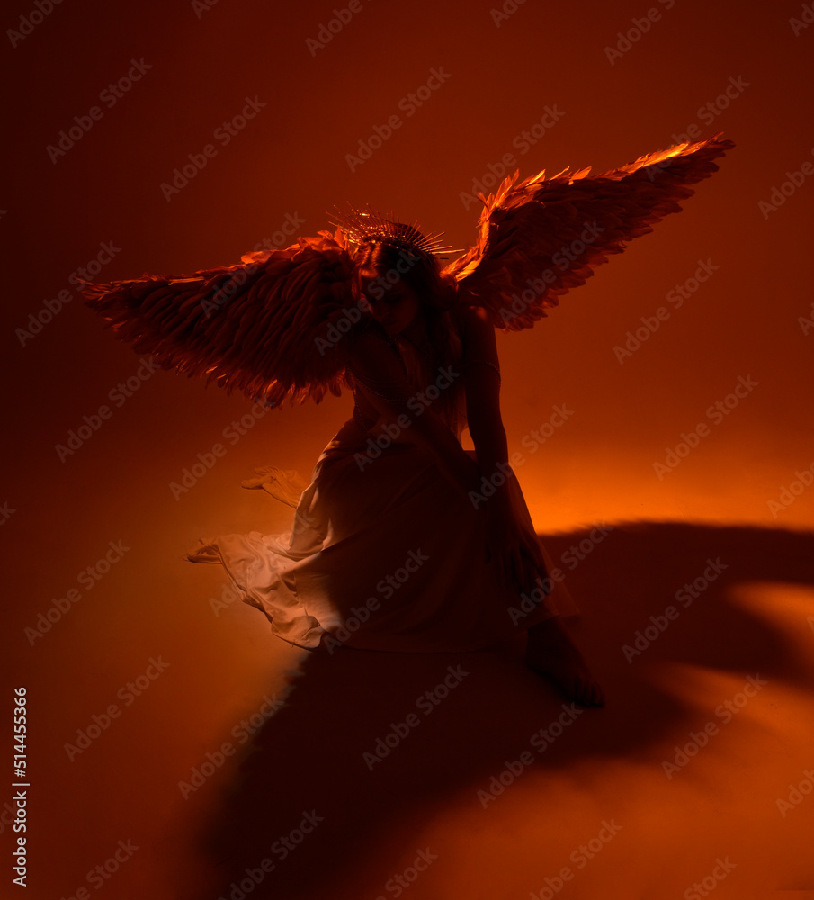 Full length portrait of beautiful red head woman wearing long flowing ...