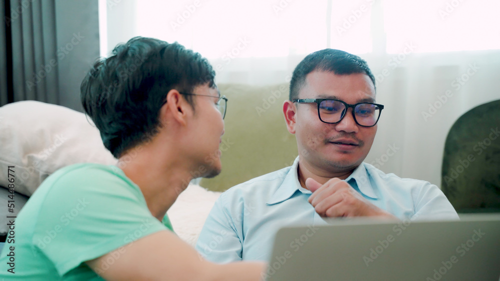 Close-up of the faces of two male lovers, who are sitting and thinking ...