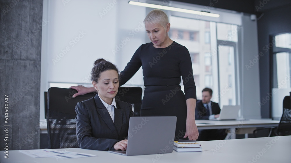 Bossy business lady annoyed with employee's work results, criticizing ...