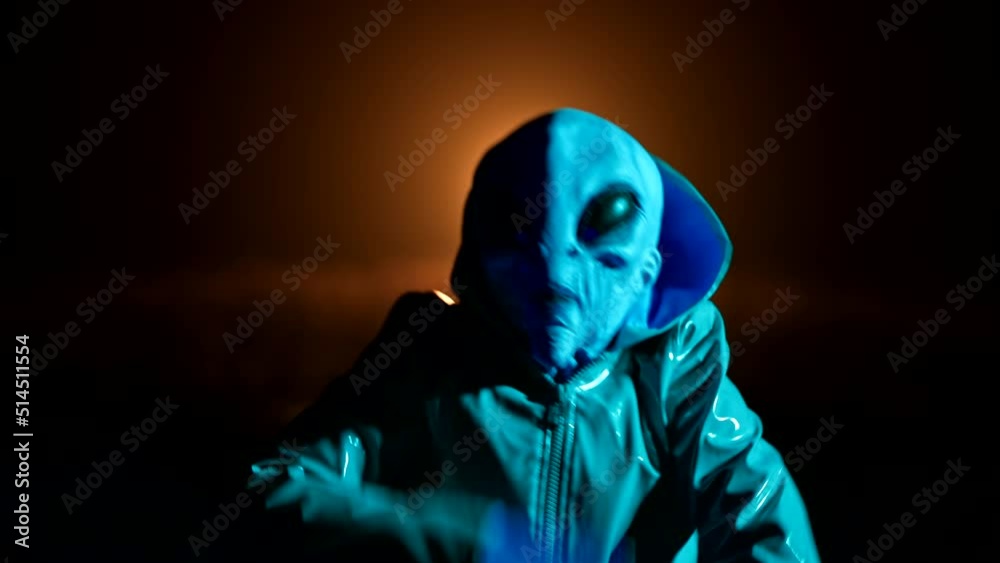 Hilarious alien dancing on dark backdrop. Funny meme footage of arrived ...