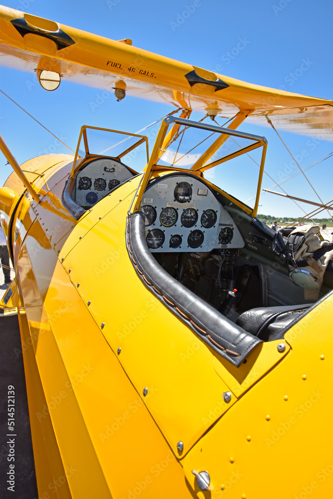 The dual cockpits of a biplane on the tarmac at an airshow. Stock Photo ...