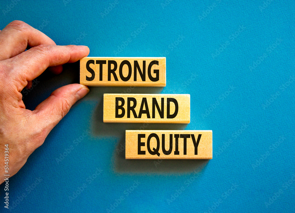 Strong brand equity symbol. Concept words Strong brand equity on wooden ...