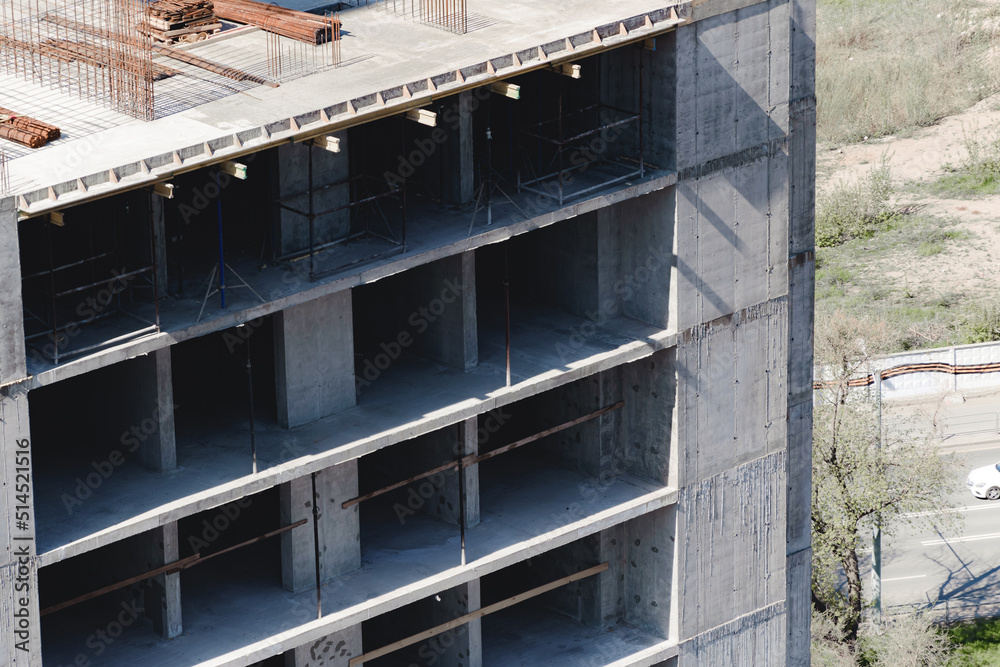 crane at construction site panorama of city. unfinished building ...
