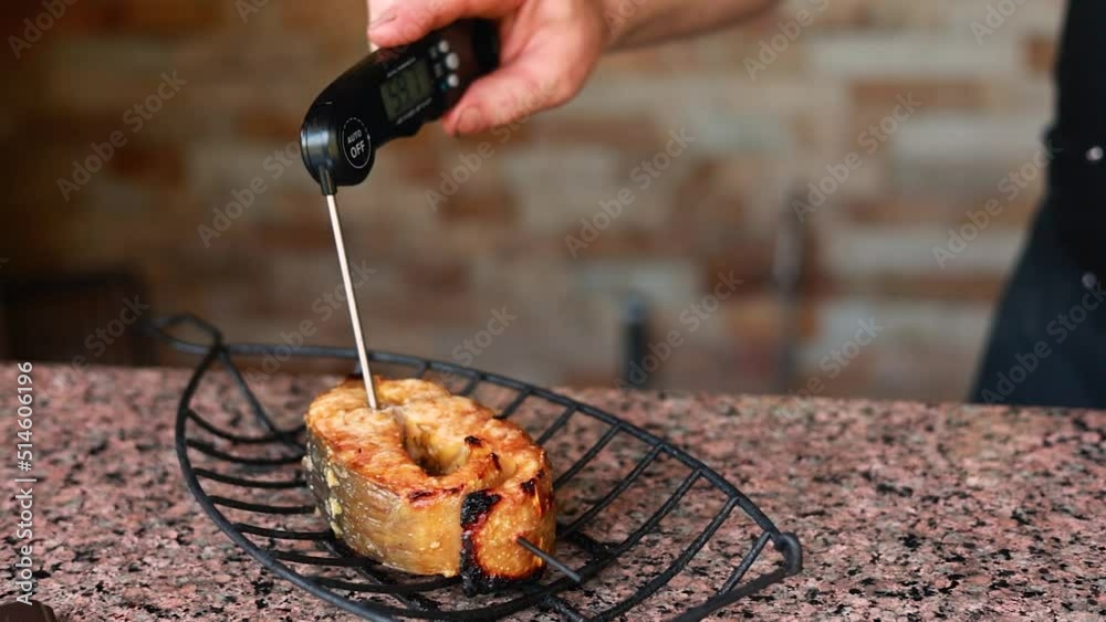 grilled fish prepared by a chef in a restaurant kitchen Stock Video ...