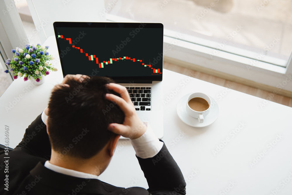 Sad businessman with market stock bar chart going down. Stock Photo ...