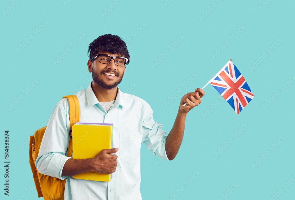 Studying in England. Portrait of happy Indian male university student ...