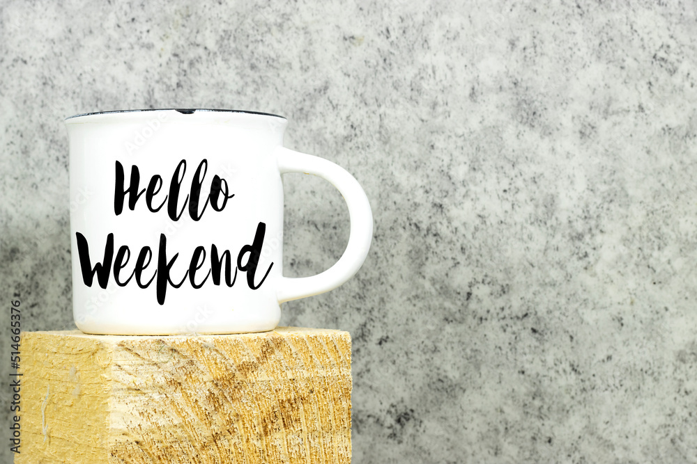 Hello weekend word concept on cup of coffee above a big 3d cubes Stock ...