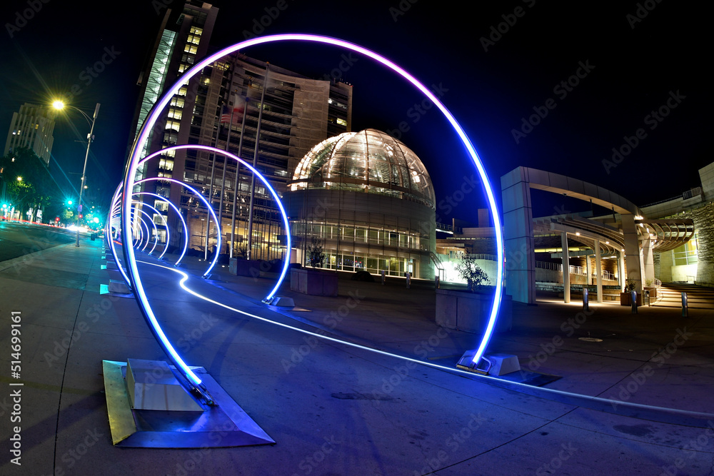A long exposure renders skate boarder invisible but light on rear of ...