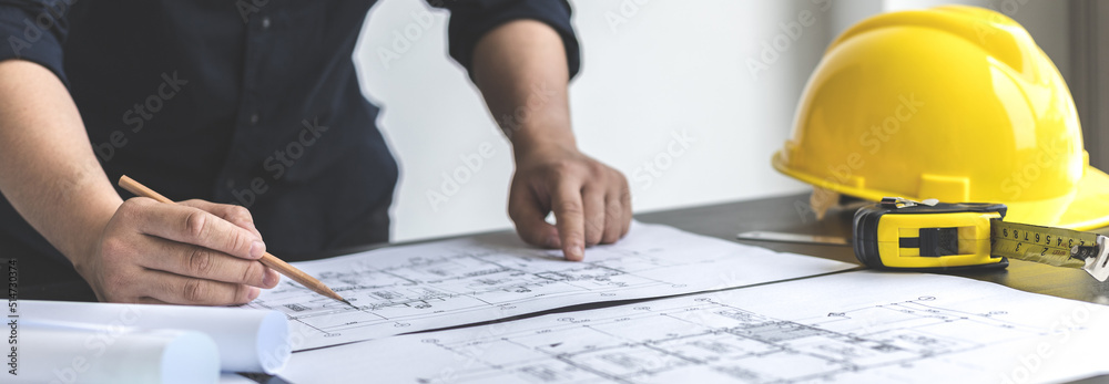 Architectural building design and construction plans with blueprints ...